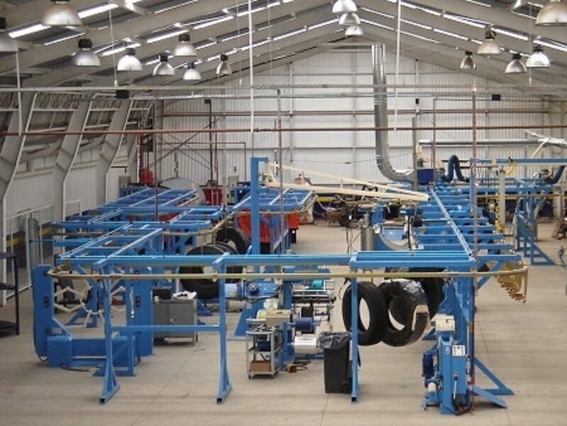 COMPLETE RETREADING PLANT - Modular monorails and in-line stations